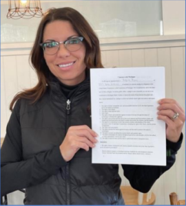 Angela Rigas, candidate for State House of Representatives, signs ...